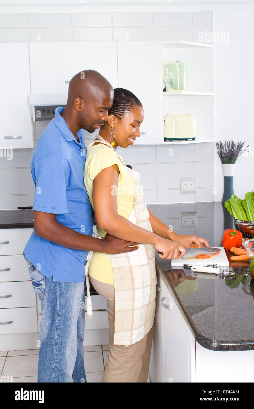 african couple cooking in home kitchen Stock Photo - Alamy