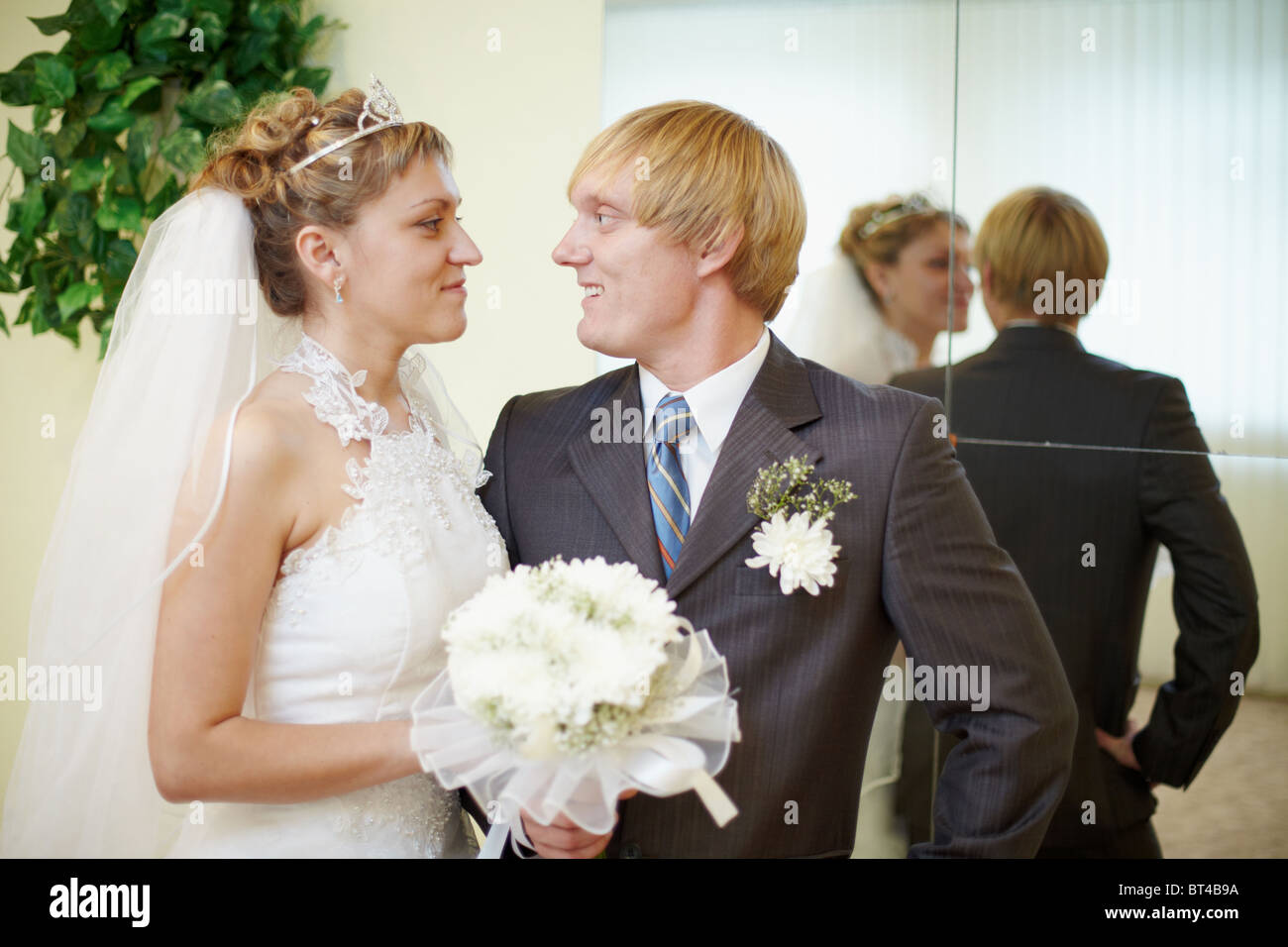 The bride and groom looking at each other Stock Photo - Alamy