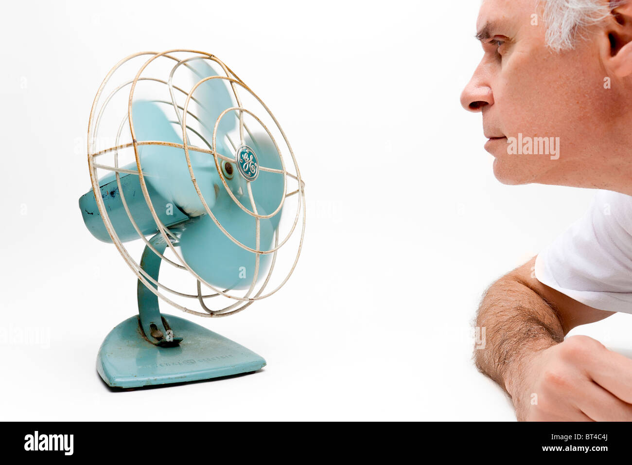 Man with Antique Electric Fan Stock Photo - Alamy