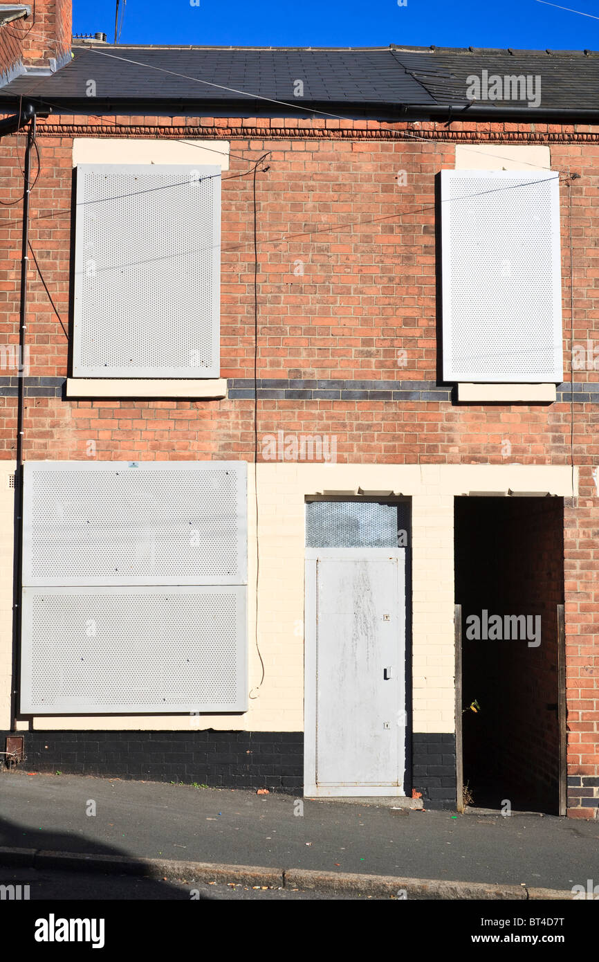 House boarded up windows hi-res stock photography and images - Alamy