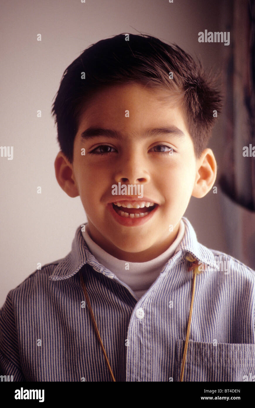 Young hispanic boy laugh male hi-res stock photography and images - Alamy