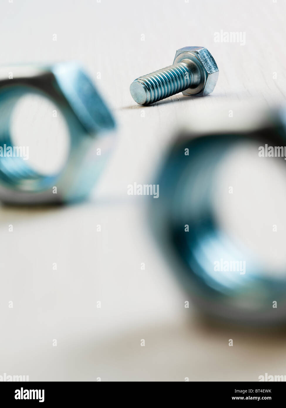 screw bolt on wooden floor. Copy space Stock Photo - Alamy