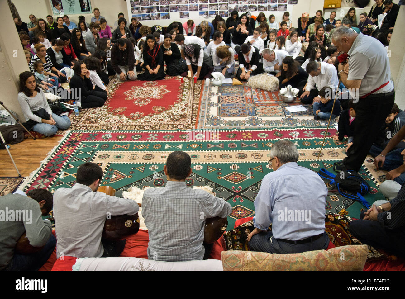ALAWITE COMMUNITY IN LONDON CEM EVI IN RELIGIOUES CEREMONY Stock Photo ...