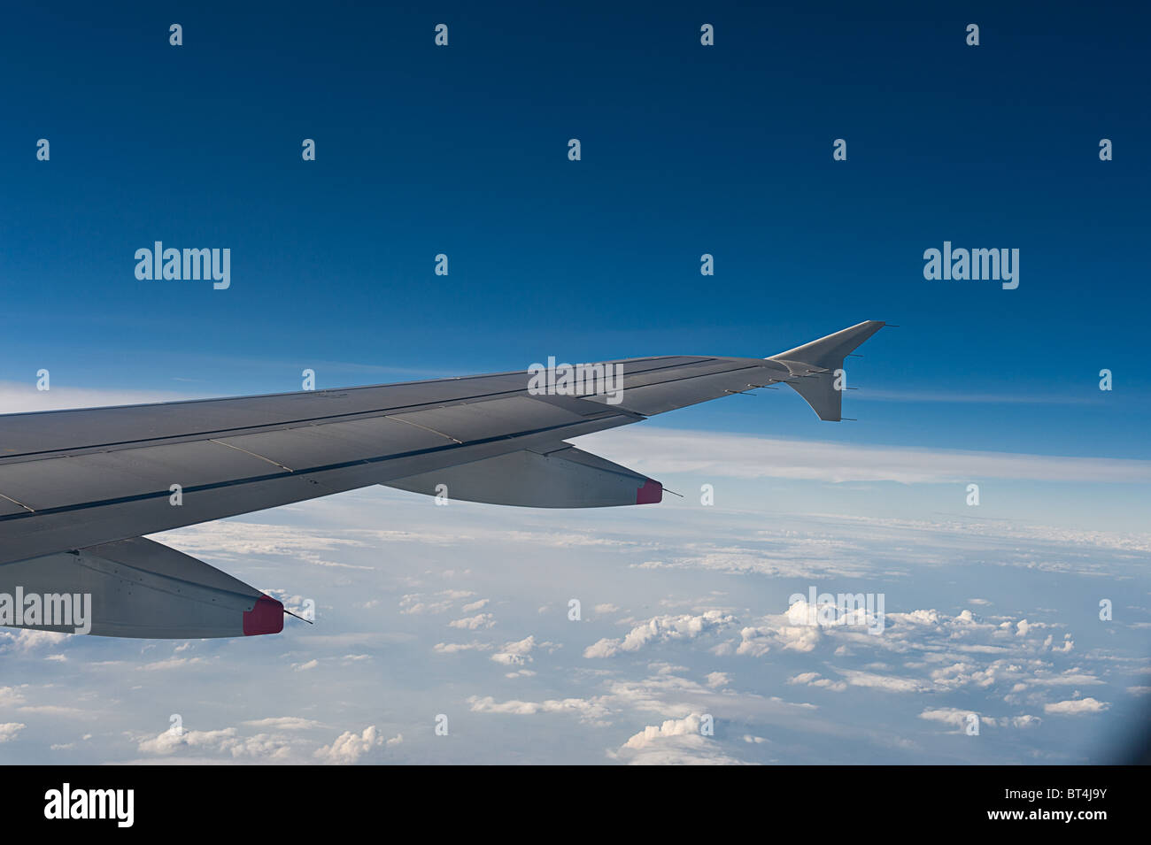 Airbus A330 wing in flight over Europe Stock Photo - Alamy
