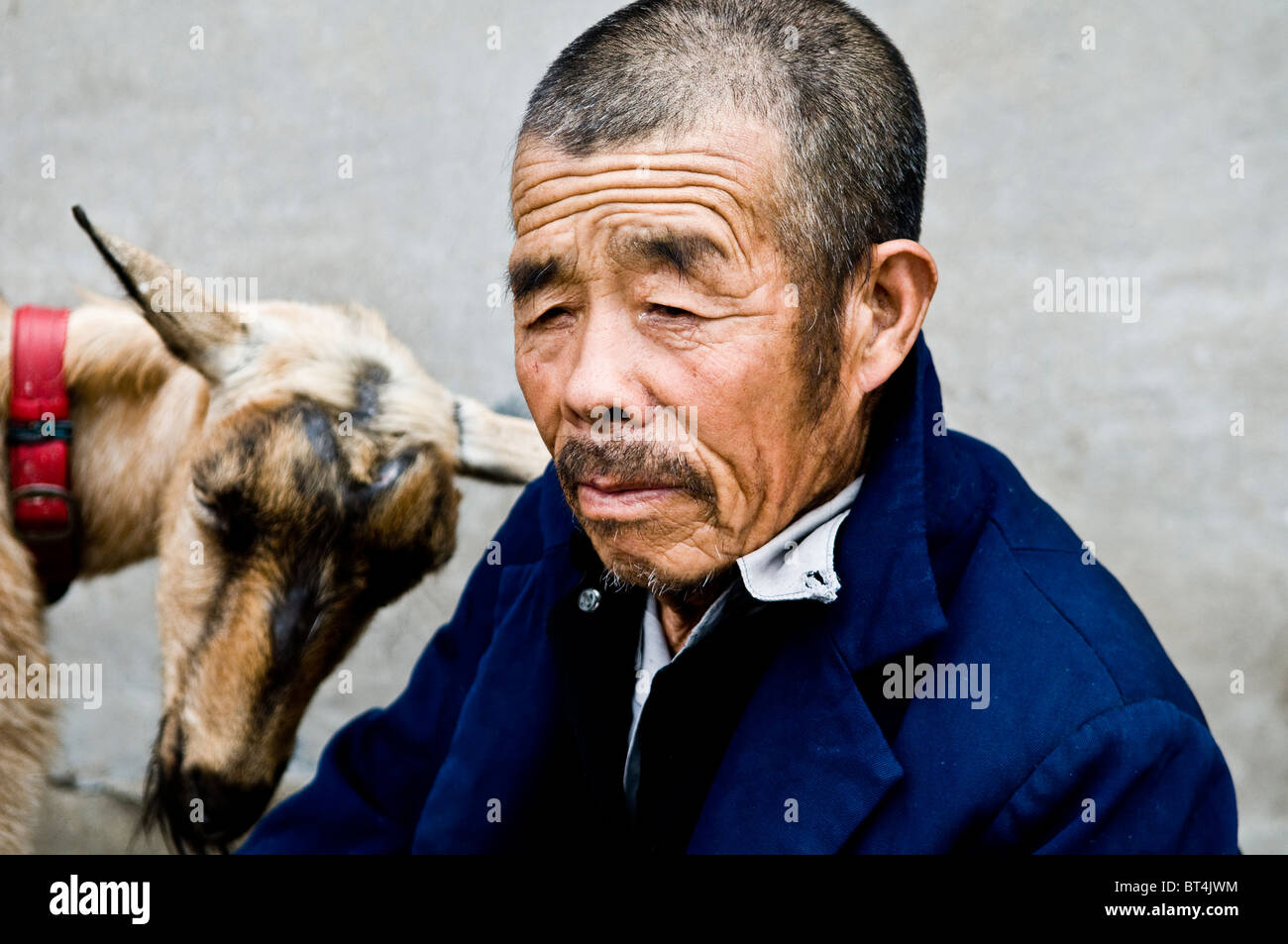 Man and goat hi-res stock photography and images - Alamy