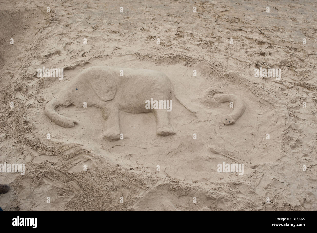 Elephant sculpture in sand, made during the Thames festival 2010 on a ...