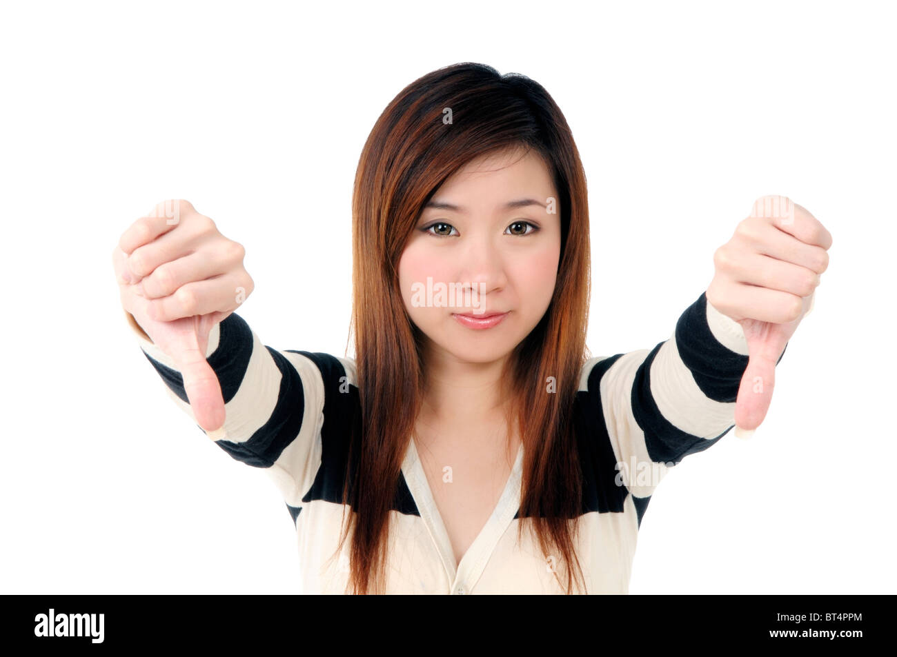 Beautiful woman showing thumbs down sign Stock Photo - Alamy