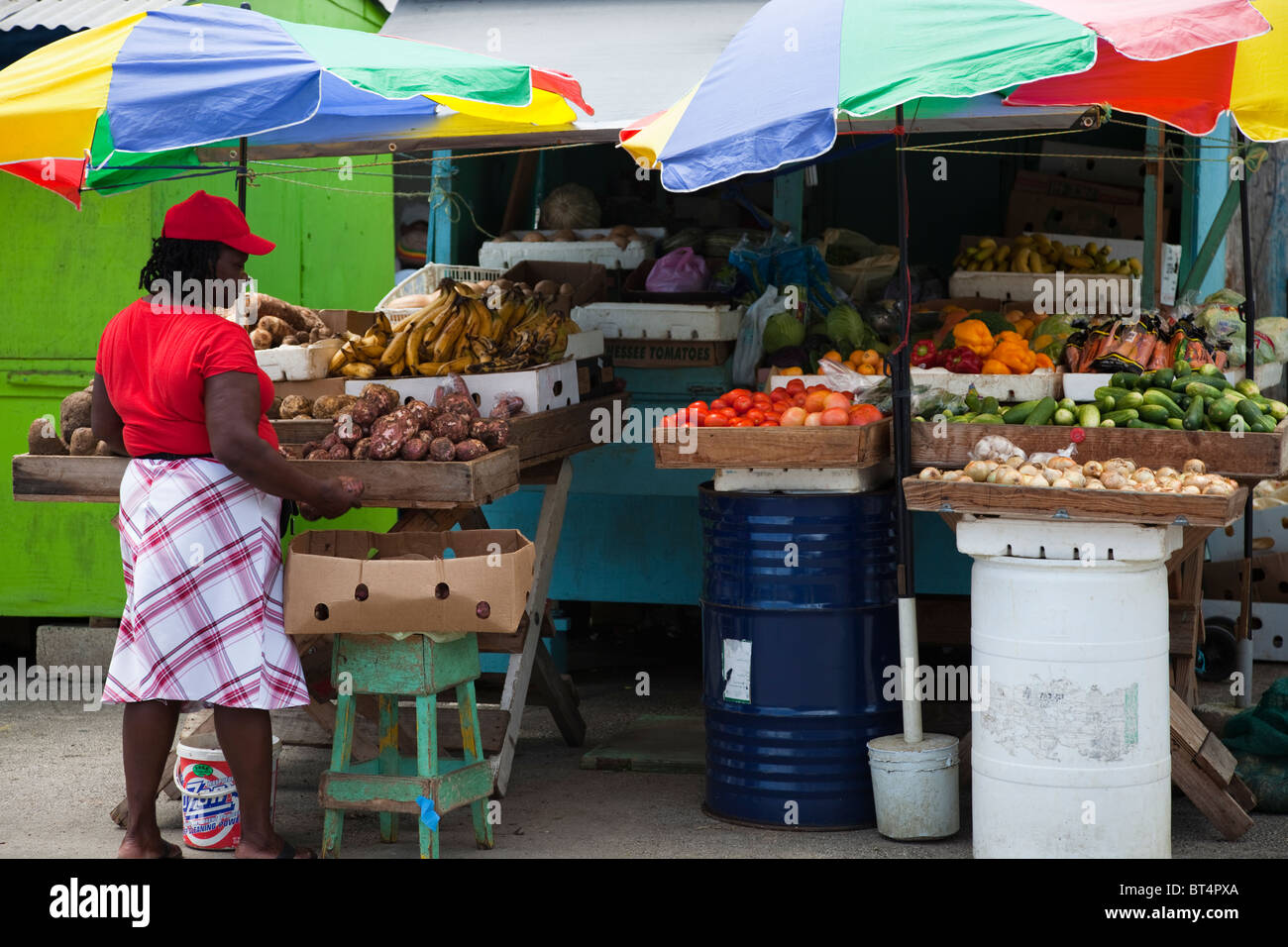 Woman selling fresh fruit from a street stall in Bridgetown, Barbados ...