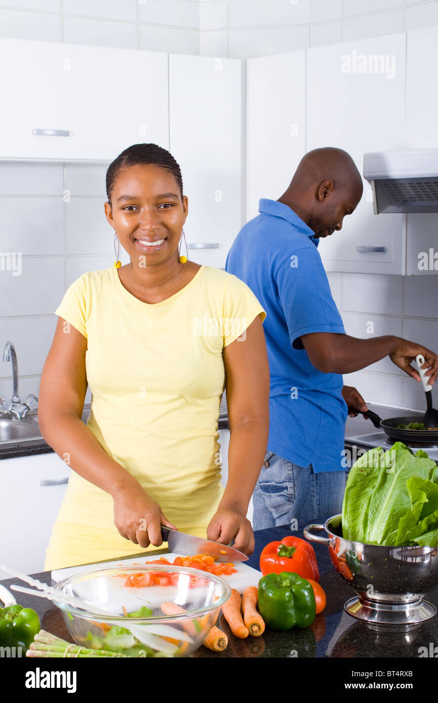 african couple cooking in home kitchen Stock Photo - Alamy