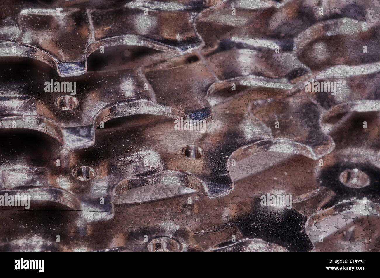 bicycle cog cassette details grunge background Stock Photo - Alamy