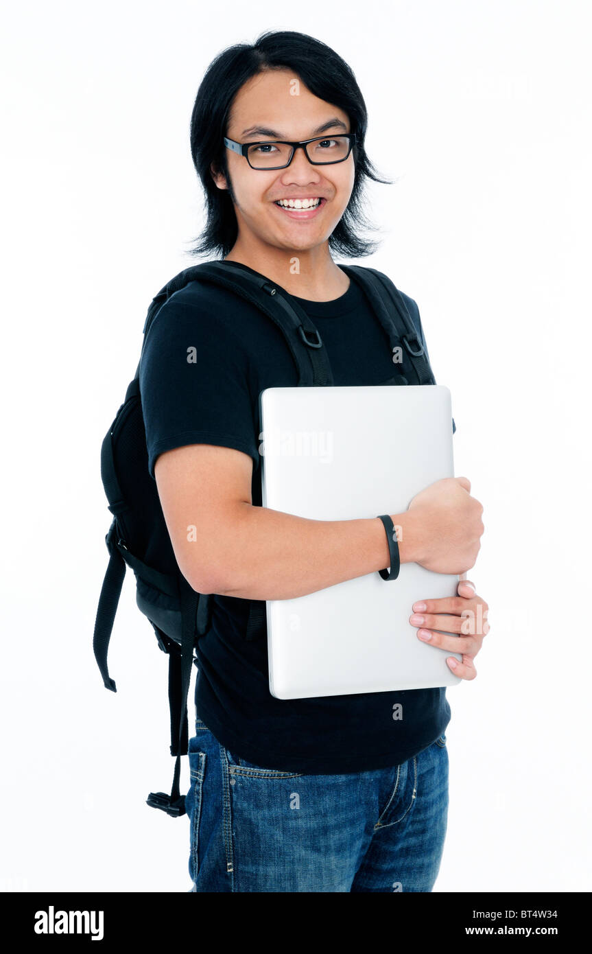 Happy student carrying laptop and backpack, portrait Stock Photo - Alamy