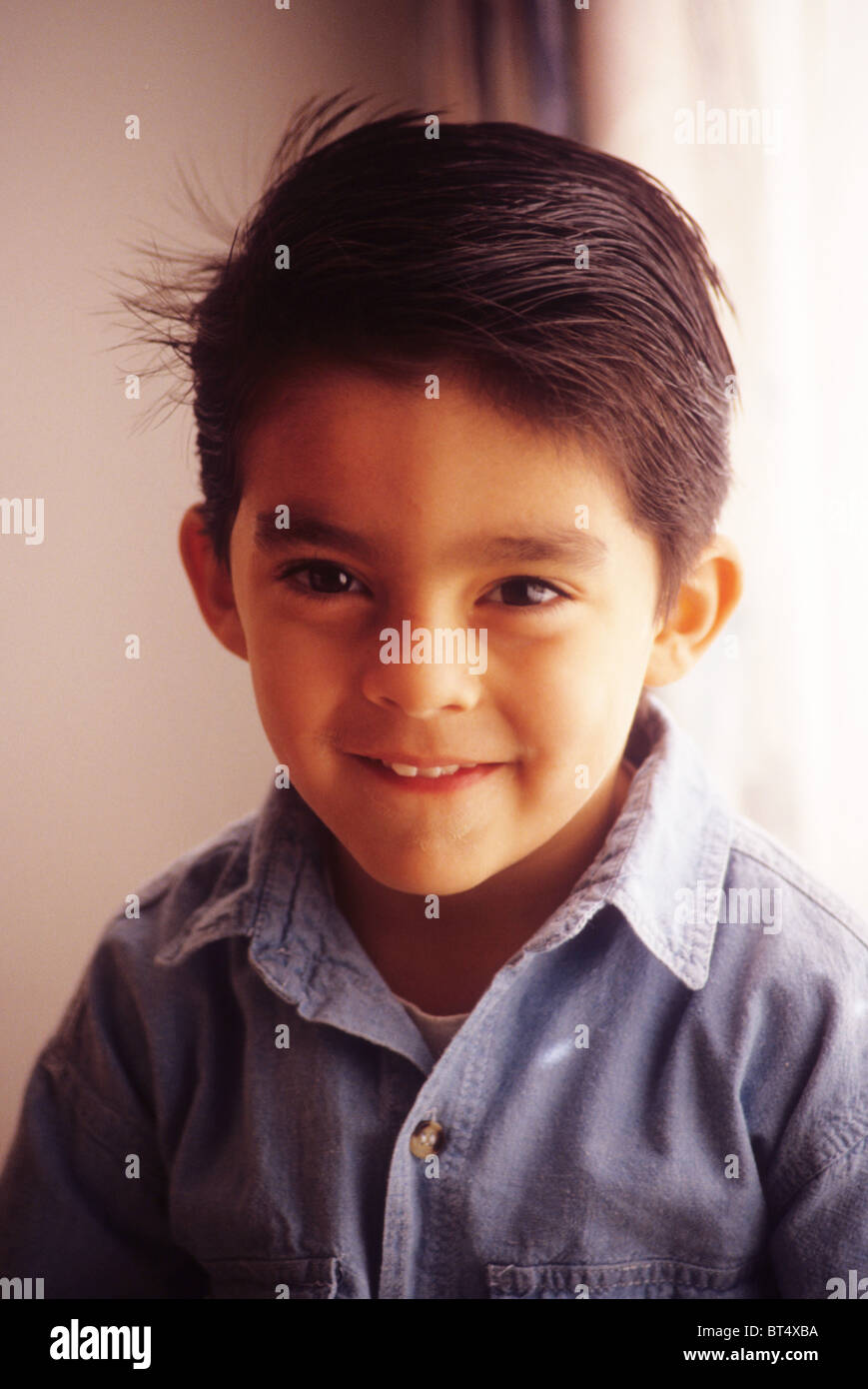Young Hispanic boy laugh male happy fun smile love cozy sun warm friend ...