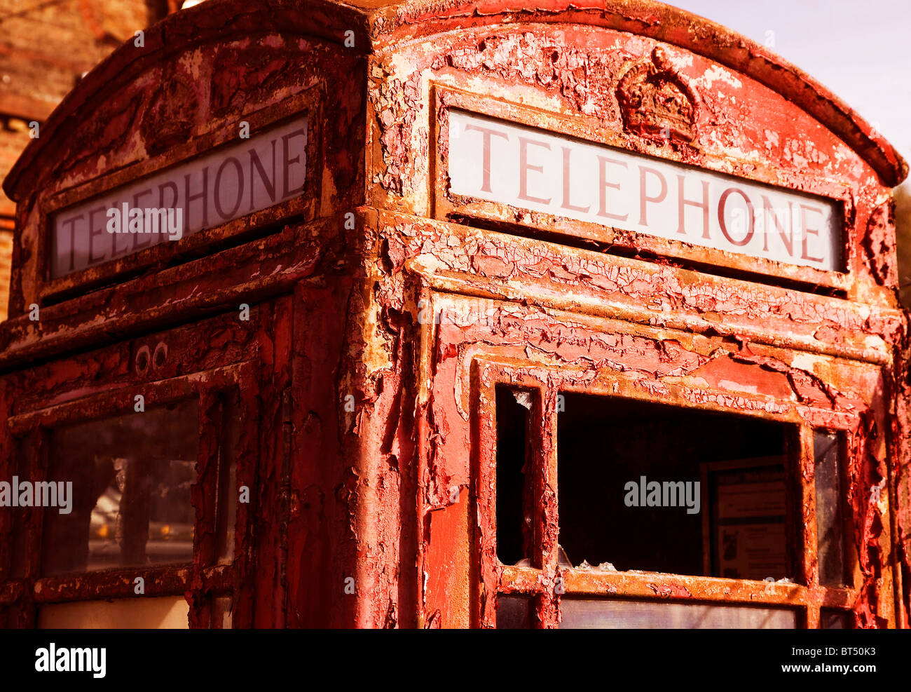 A broken and old red telephone box Stock Photo - Alamy