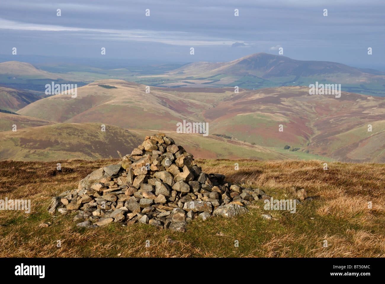 Cairn on Culter fell, Southern Uplands, Scotland, with Tinto in the ...
