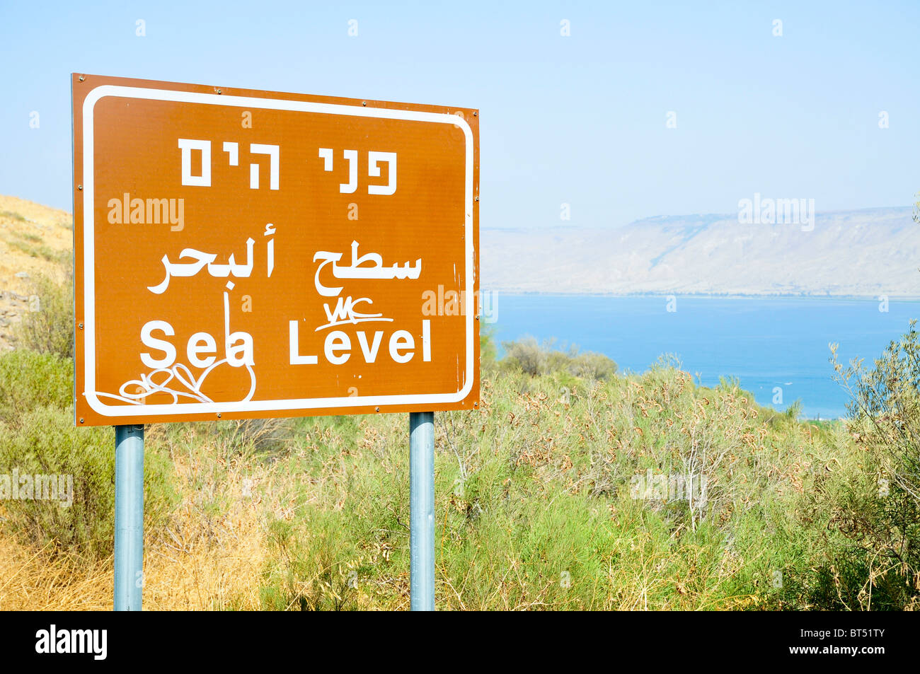 Israel, Lower Galilees, View of the Sea of Galilee. Sea level sign ...