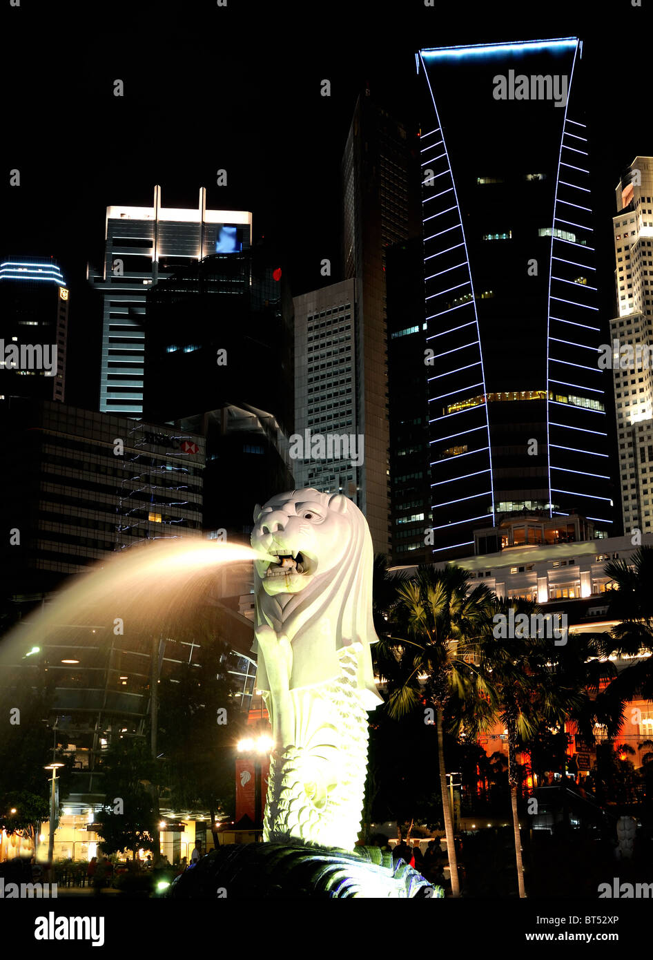 The Merlion statue in Singapore in the night Stock Photo - Alamy