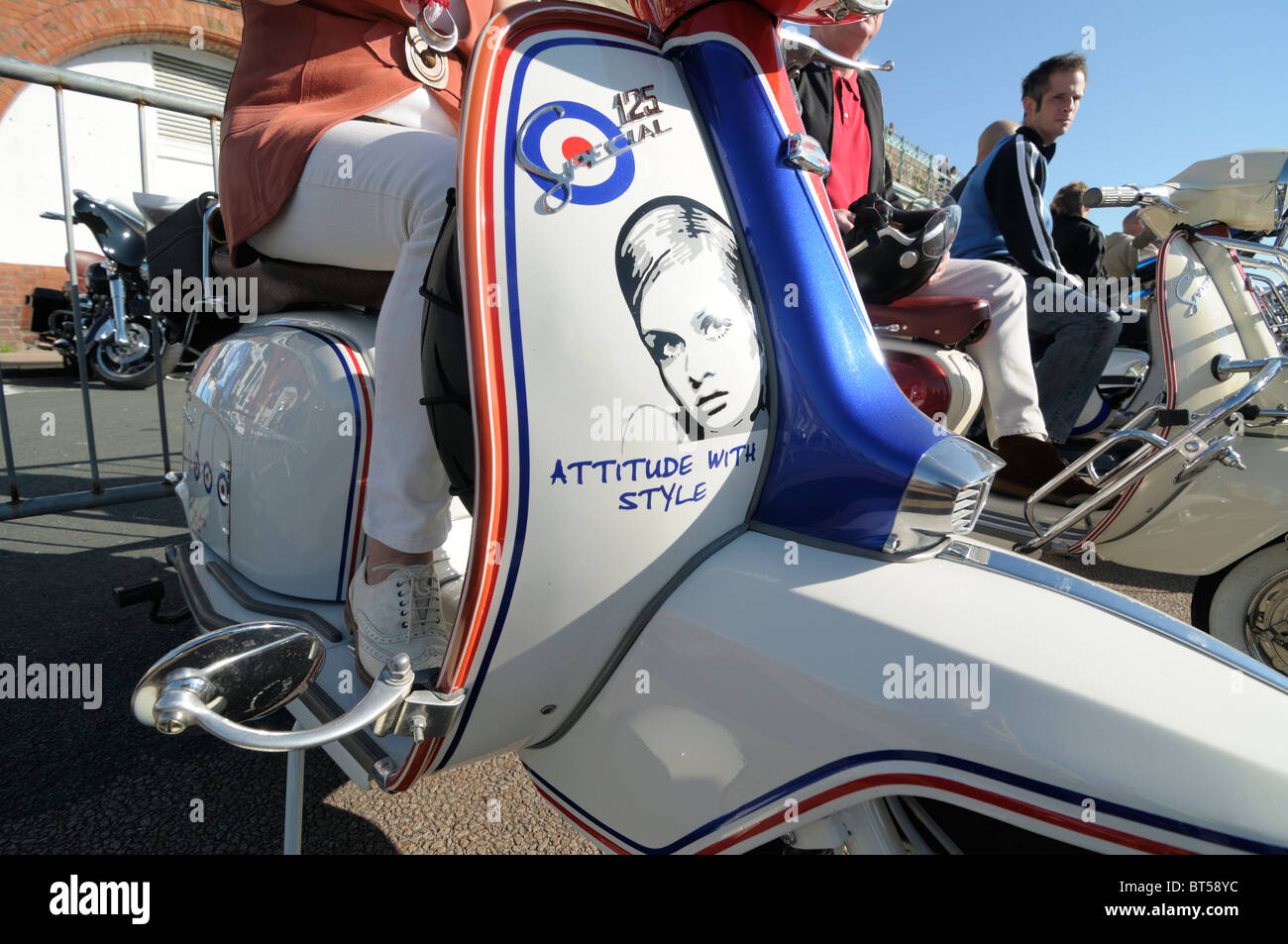 Mods with Twiggy-themed Lambretta scooter, Brighton Stock Photo - Alamy