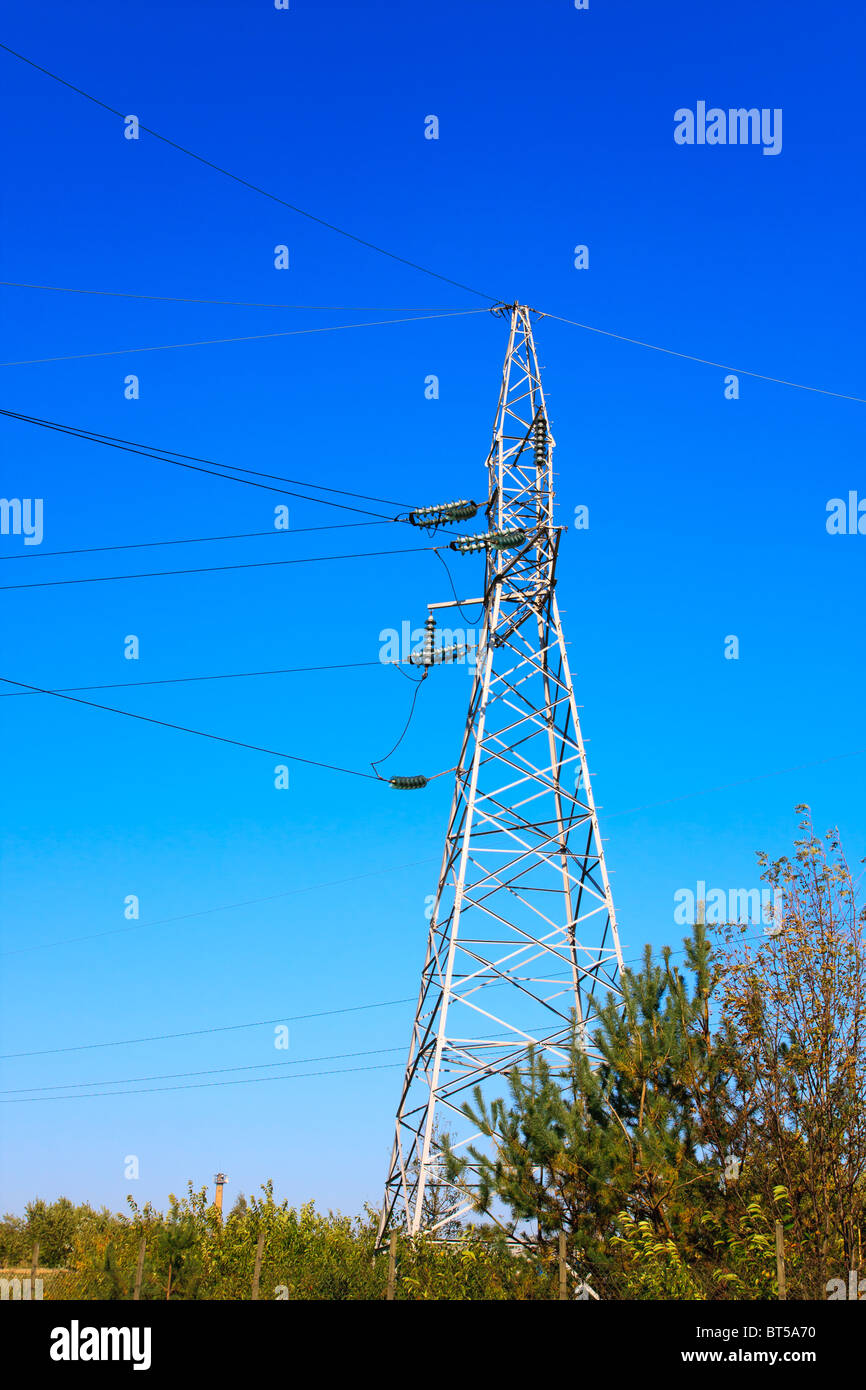 High voltage pylon with clear blue sky background Stock Photo - Alamy