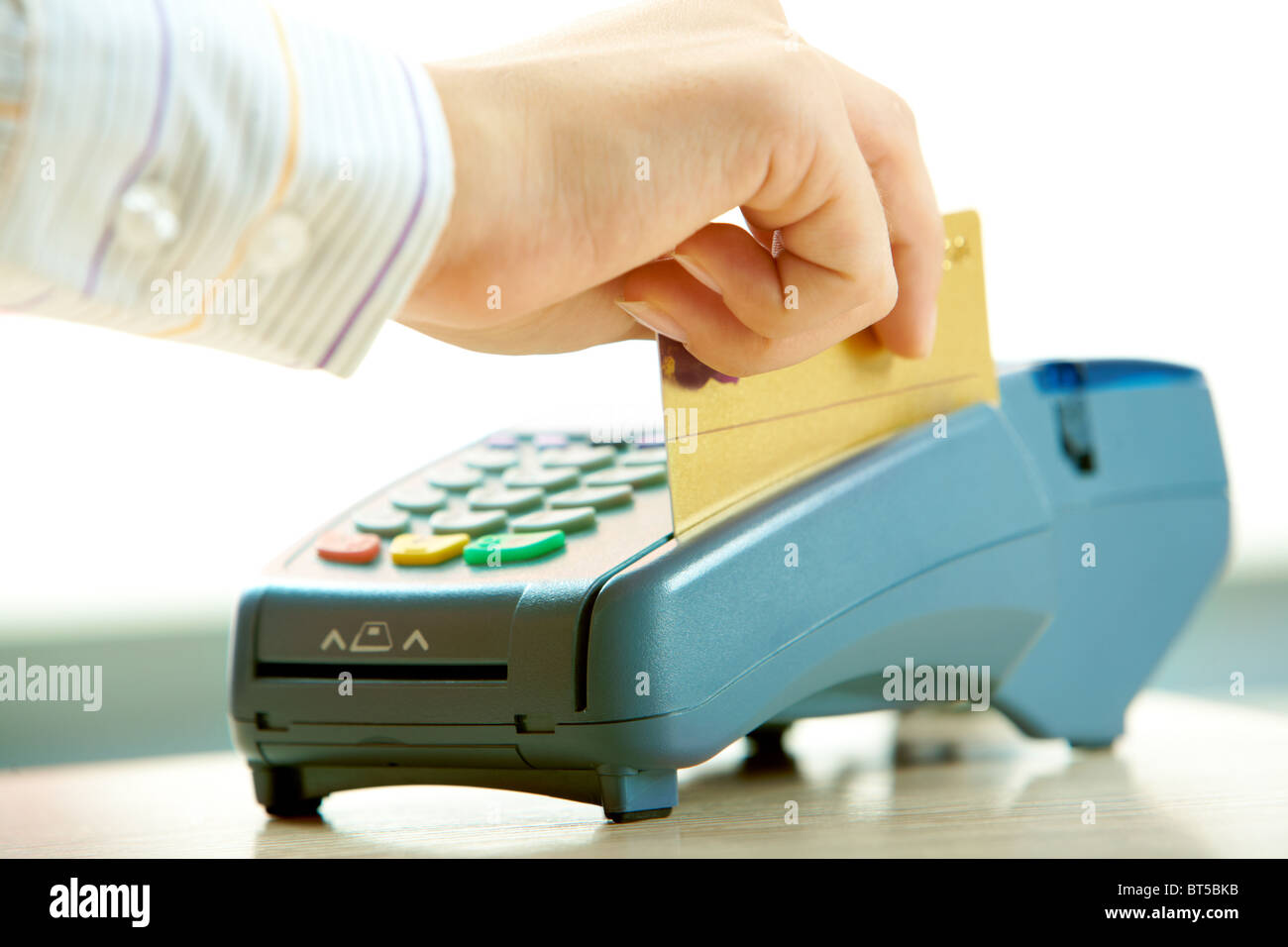 Hand putting plastic card hi-res stock photography and images - Alamy