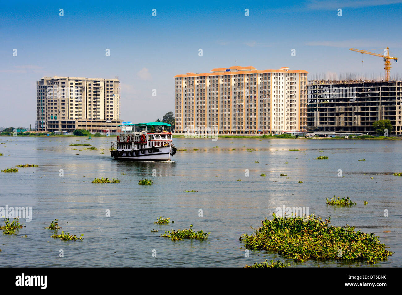 Cochin harbour tourist boat and sea view apartments.Kerala, India Stock ...