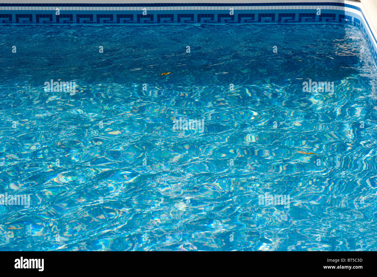 Rippled surface of water in swimming pool Stock Photo - Alamy