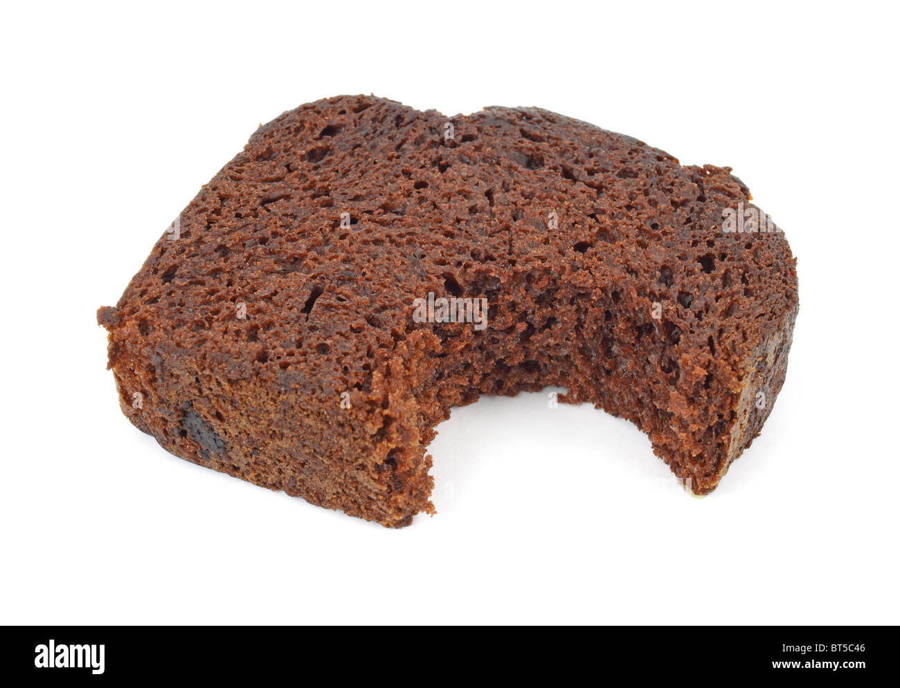 Single slice of chocolate cake that has been bitten Stock Photo - Alamy