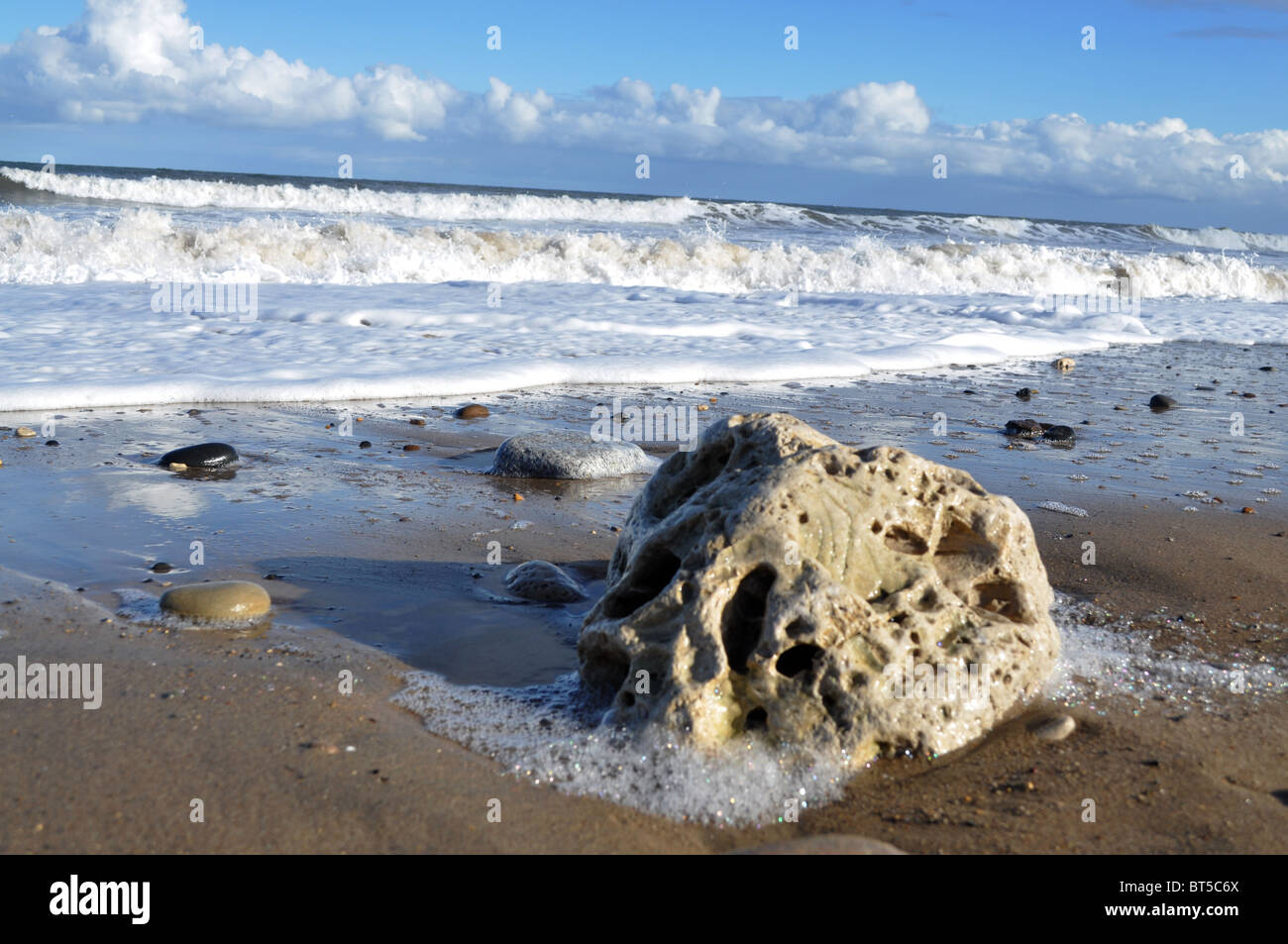 Rock on the beach Stock Photo - Alamy