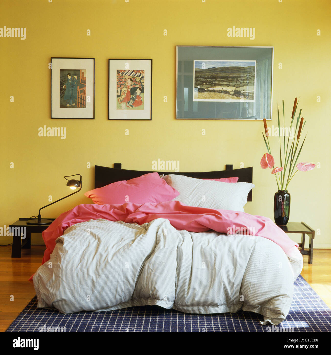 Group of pictures above untidy bed with pink quilt and white duvet in ...