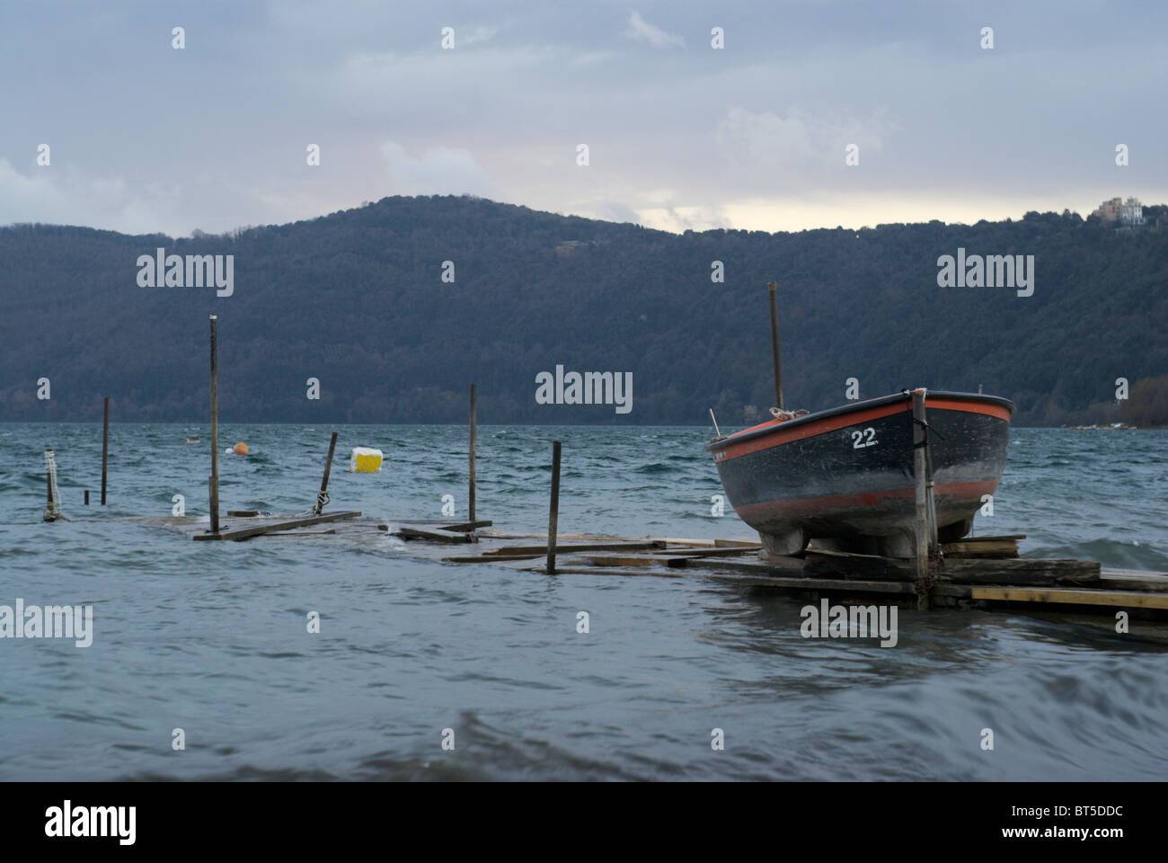 Wooden pier with boat hi-res stock photography and images - Alamy