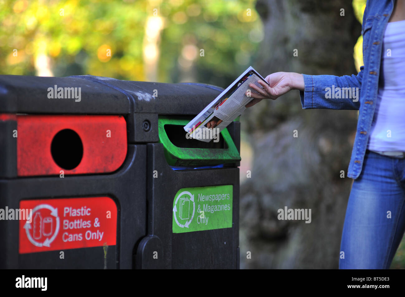 Woman recycling paper Stock Photo - Alamy
