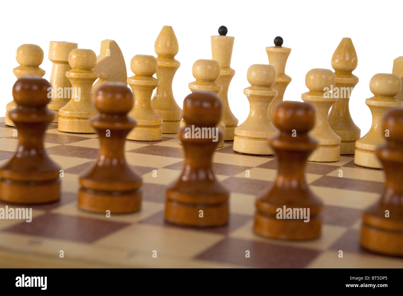 Chess-men on board on a white background Stock Photo - Alamy