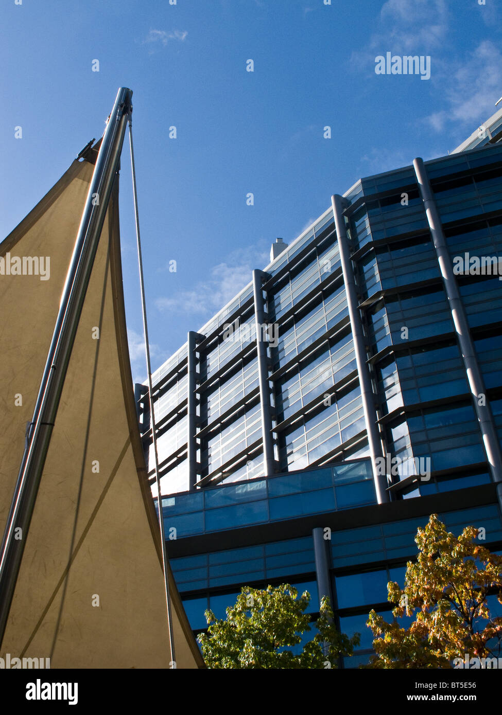 An awning in front of a modern office block Stock Photo - Alamy