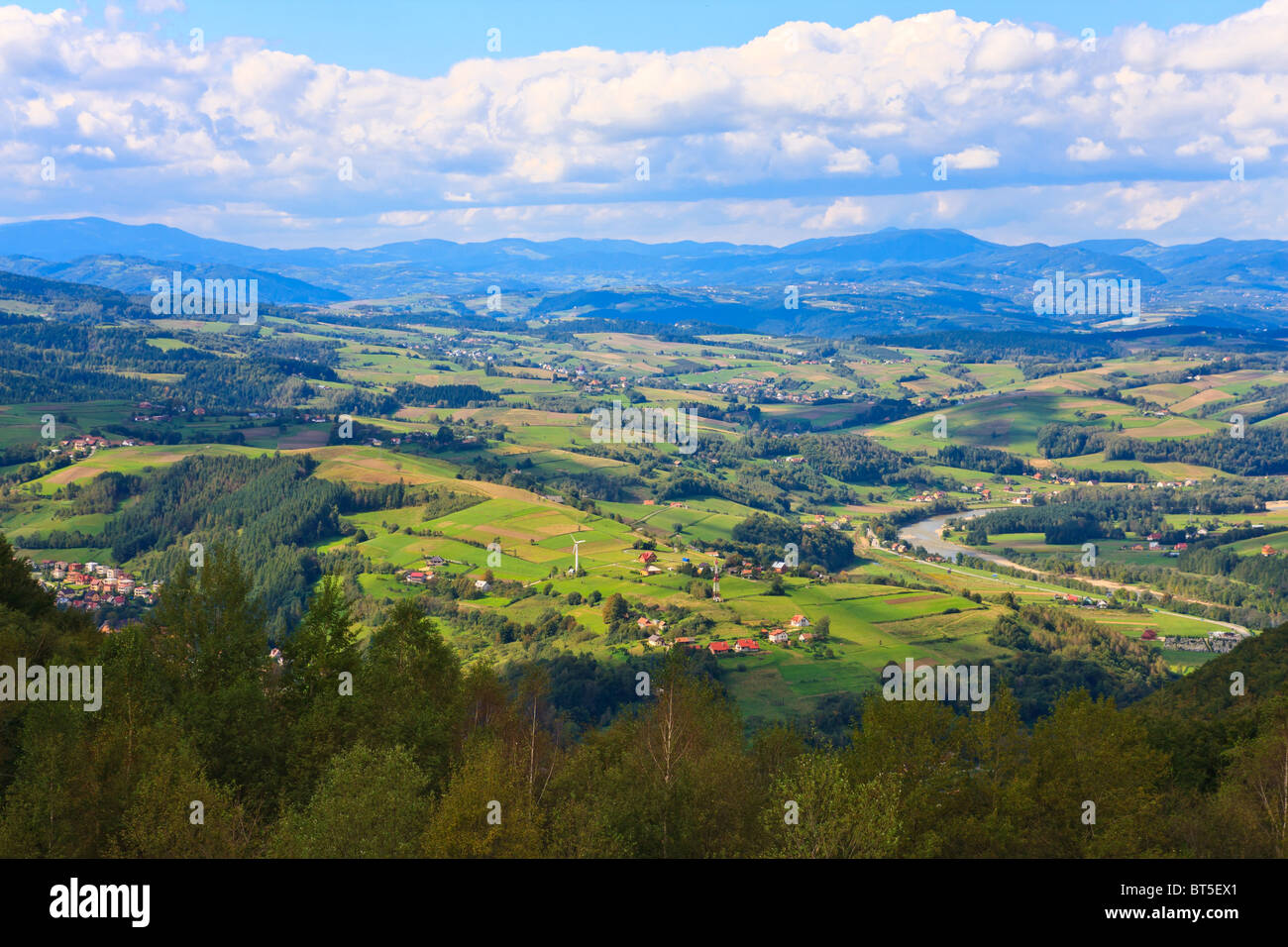 Panorama of small mountain towns in a valley Stock Photo - Alamy