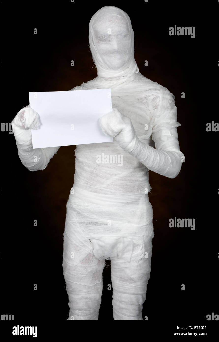 Mummy hold sheet of paper on the black Stock Photo - Alamy