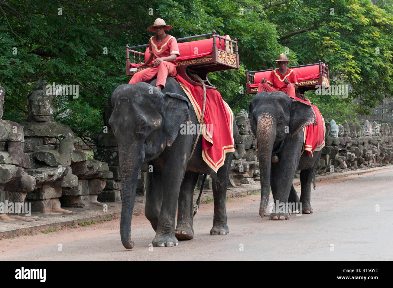 Elephant Rides on the Bridge Leading to Victory Gate in Angkor Thom ...