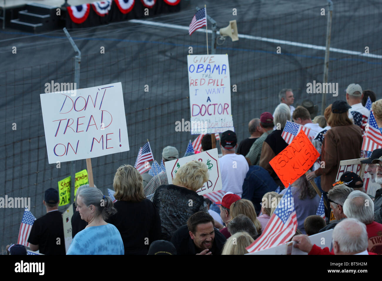 People holding signs and flags, TEA Party rally at Stateline, Idaho ...