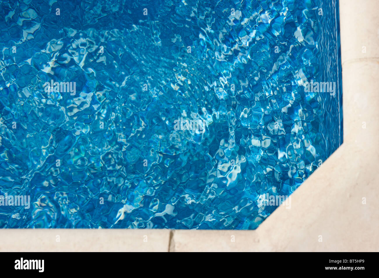Rippled surface of water in swimming pool Stock Photo - Alamy