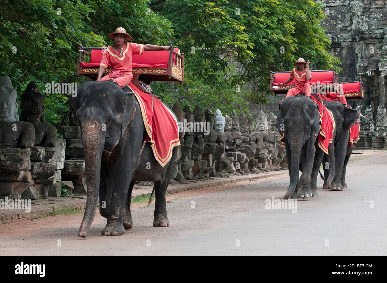 Elephant Rides on the Bridge Leading to Victory Gate in Angkor Thom ...