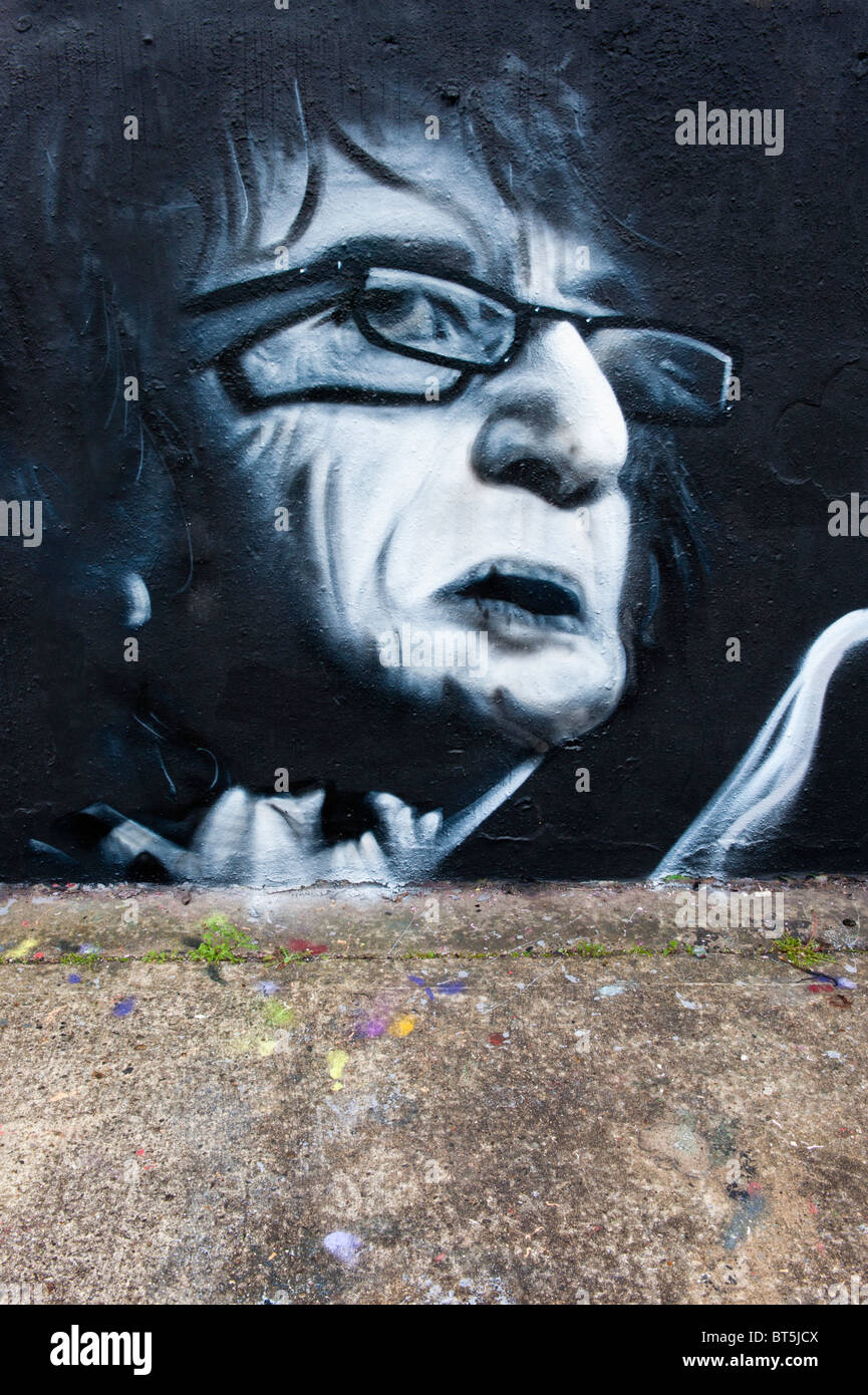 Sad face graffiti on wall hi-res stock photography and images - Alamy