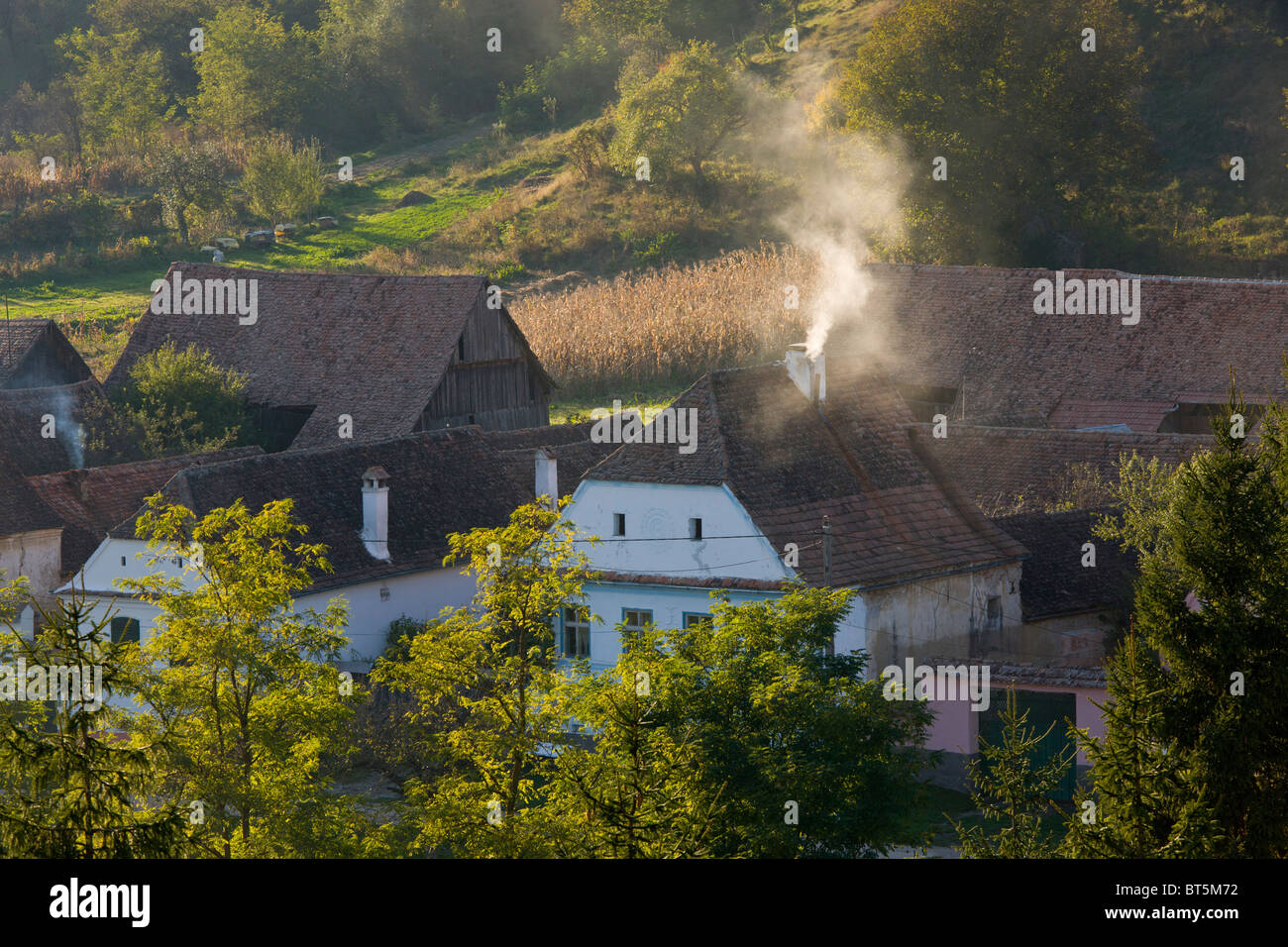 Old houses in autumn in the saxon village of Apold, Transylvania ...