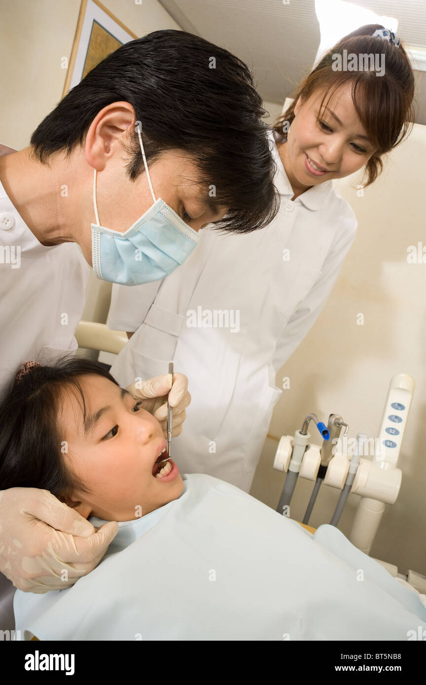 Boy undergoing dental examination Stock Photo - Alamy