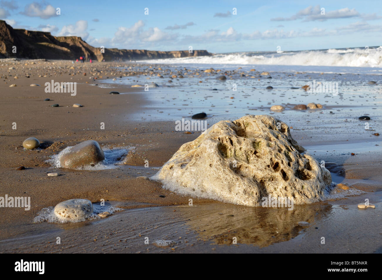 Rock on beach Stock Photo - Alamy