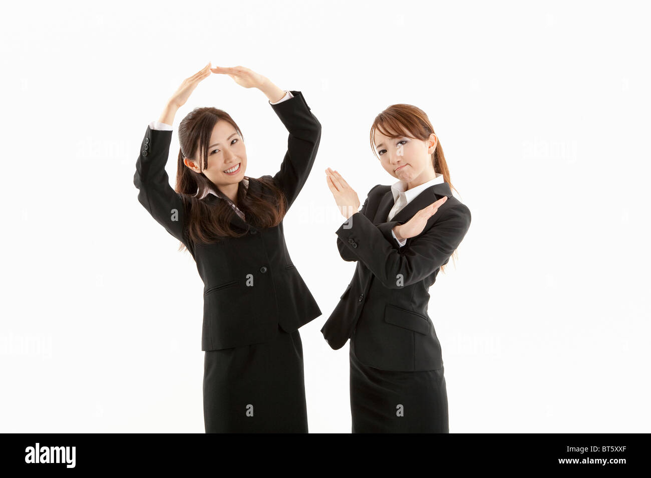 Cross hands pose Cut Out Stock Images & Pictures - Alamy