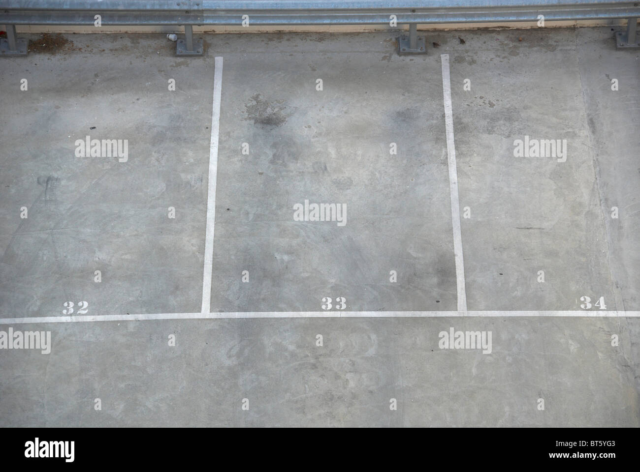 High up view of 3 parking bays from above with no cars Stock Photo - Alamy