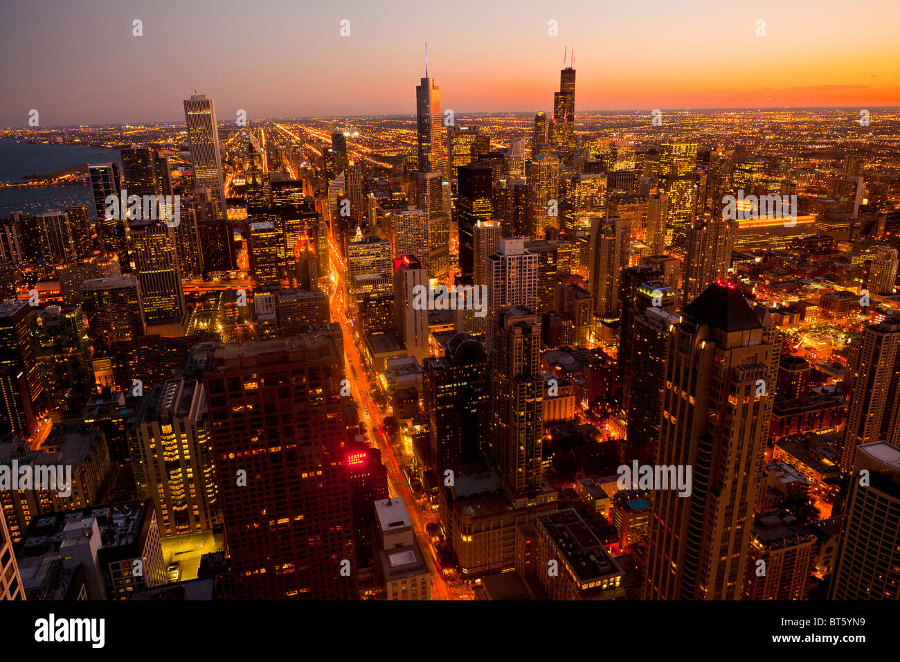 Sunset over the Chicago skyline looking south from the Hancock Tower ...