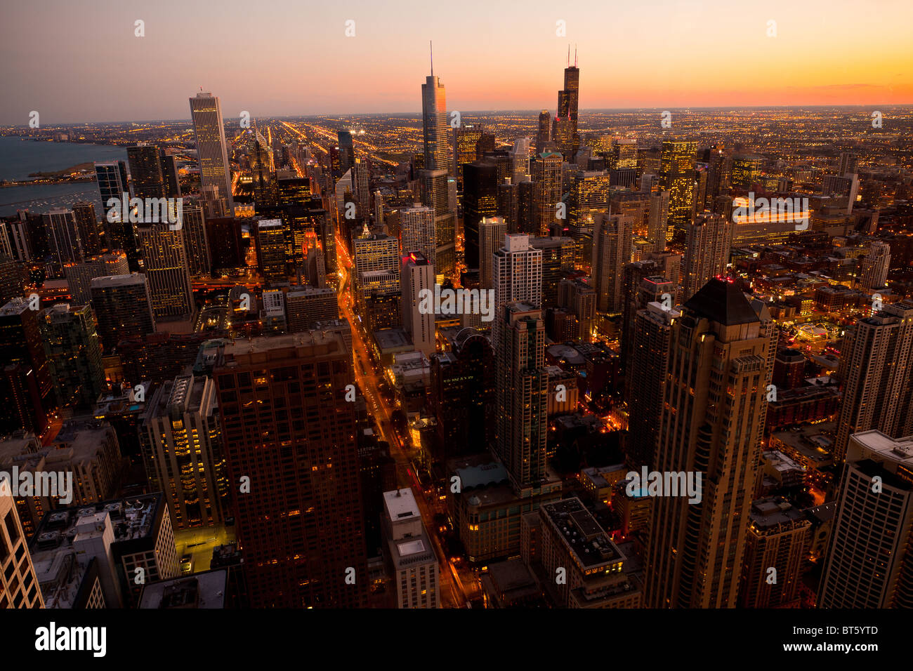 Sunset over the Chicago skyline looking south from the Hancock Tower ...