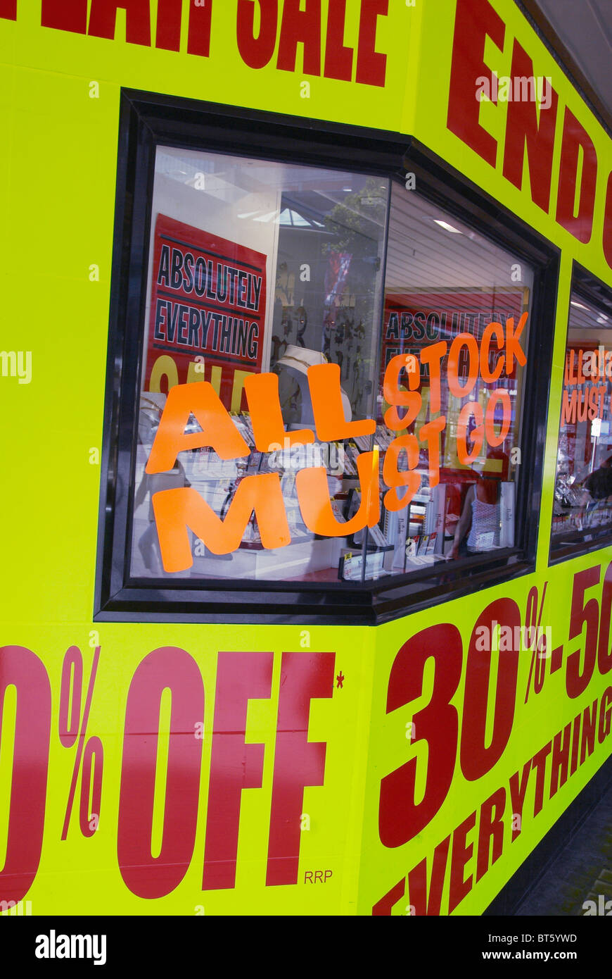 Store window display and with sale sign Stock Photo - Alamy