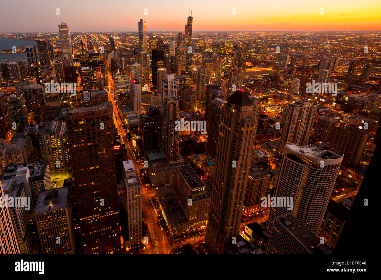 Sunset over the Chicago skyline looking south from the Hancock Tower ...