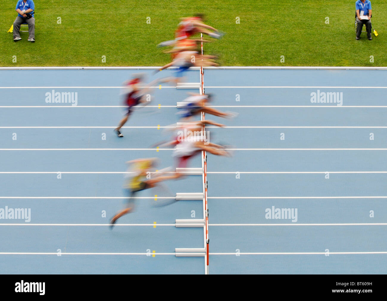 male sprinters in hurdles race during European Athletics Championships ...