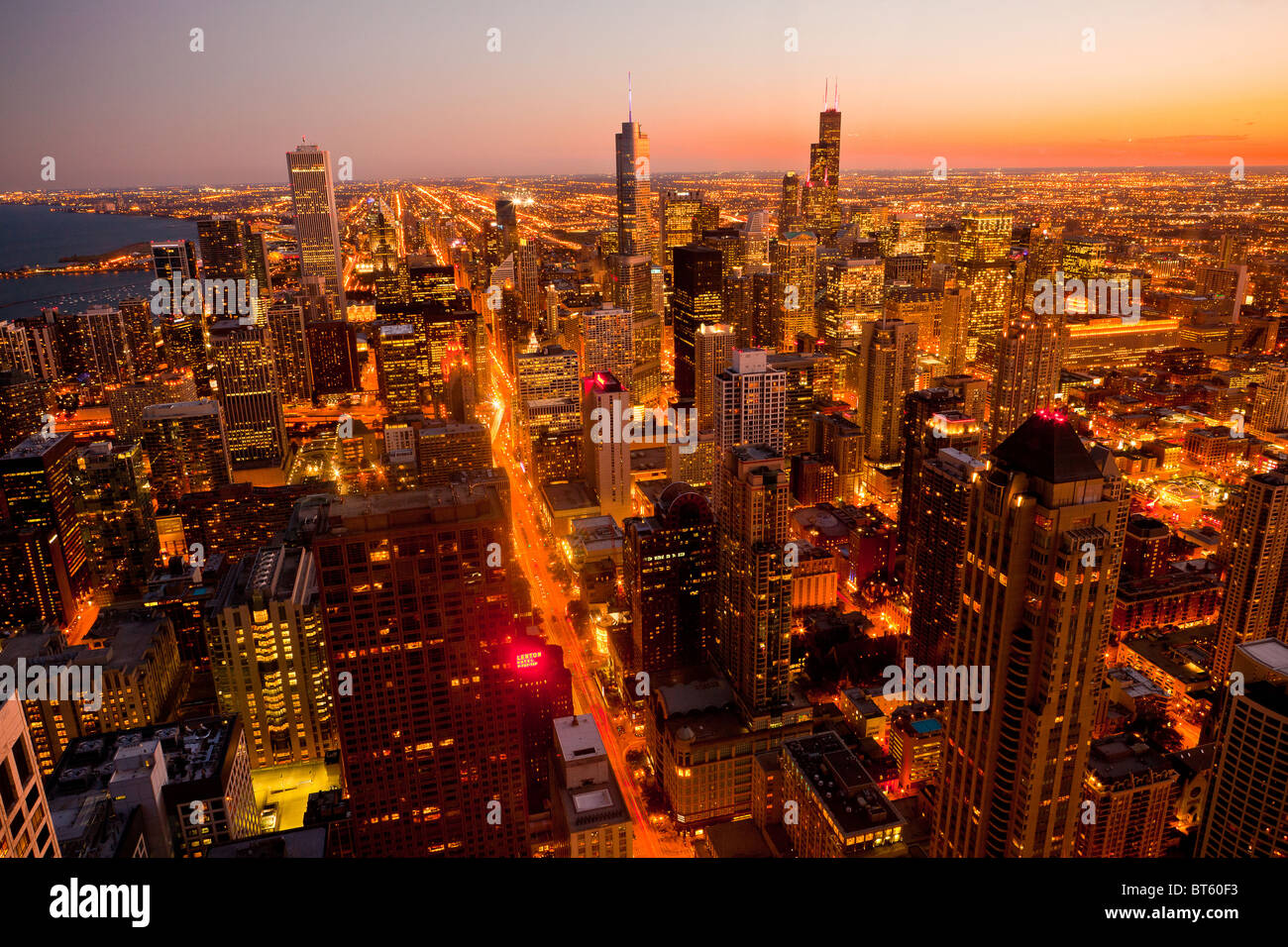 Sunset over the Chicago skyline looking south from the Hancock Tower ...